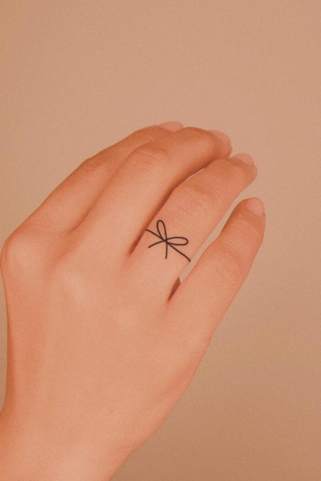 55 Unique Small Finger Tattoo Ideas